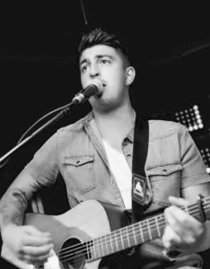 Oli – Singer/Guitarist – Bash Events Group UAE | Next Level Entertainment